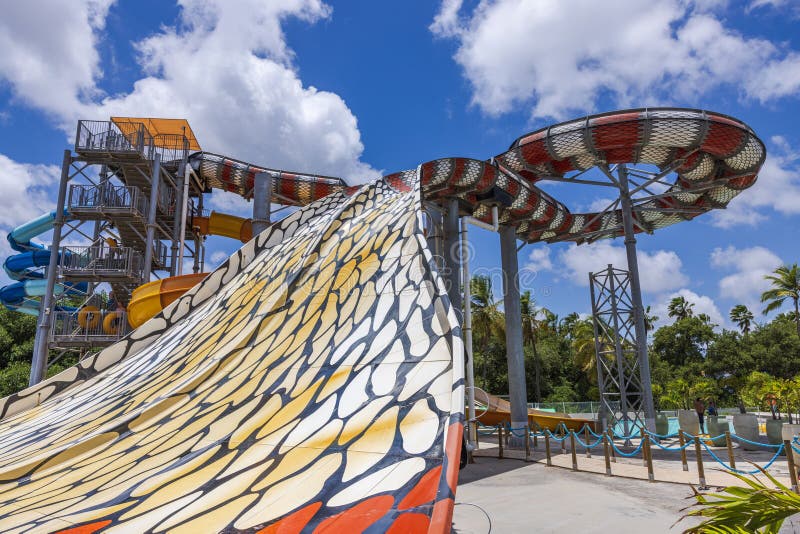 View of a Beautiful Water Slide with a Cobra-scale Pattern on Blue Sky ...
