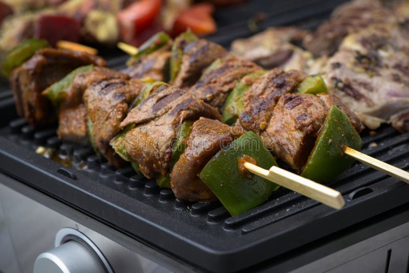 View of Beef Being Cooked on a Griddle Stock Image - Image of griddle ...