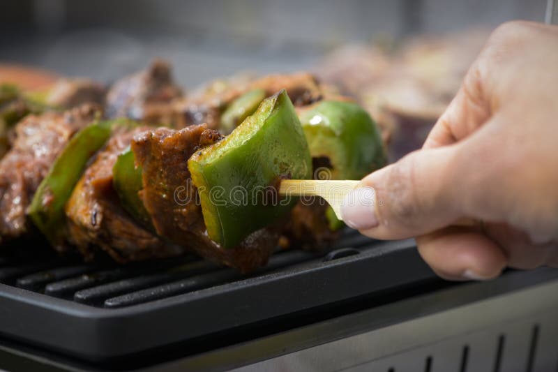 View of Beef Being Cooked on a Griddle Stock Image - Image of pepper ...
