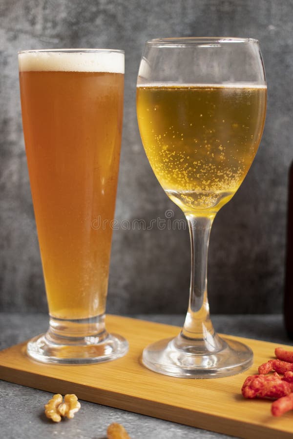 View of Beer Served in Two Glasses Stock Photo - Image of glasses ...