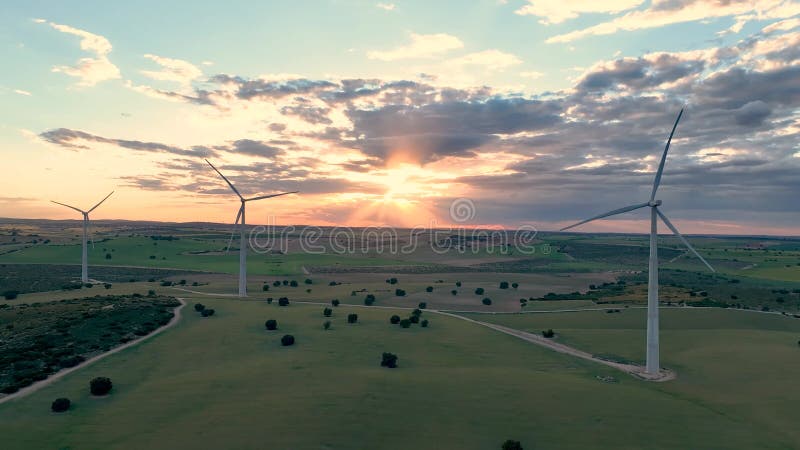 View from Behind from a Static Point in the Air of Three Wind Turbines ...