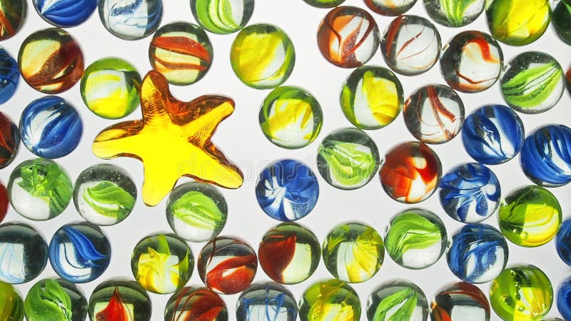 View from Below As the Hand Throws Small Multi-colored Colored Plastic ...