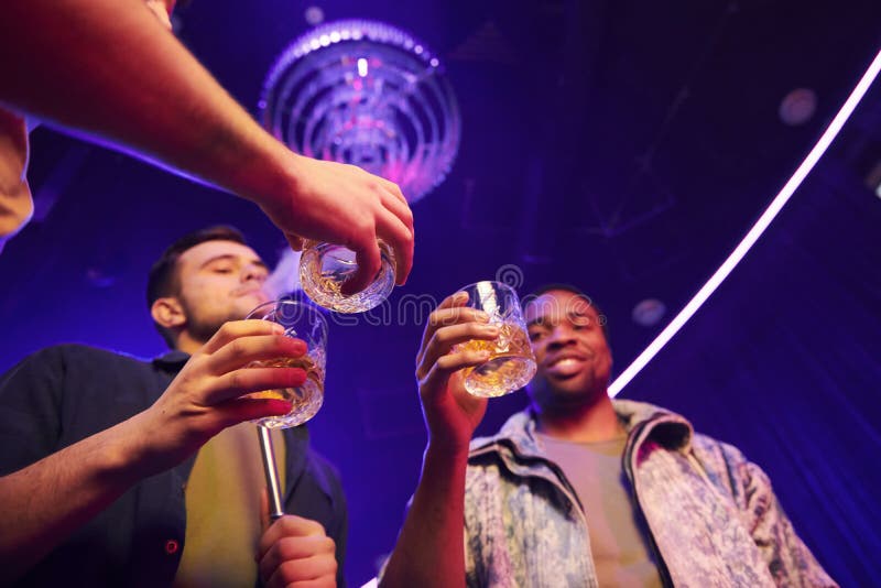 View from Below. Group of Friends Having Fun in the Night Club Together ...