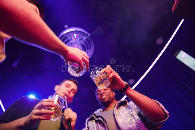 View from Below. Group of Friends Having Fun in the Night Club Together ...