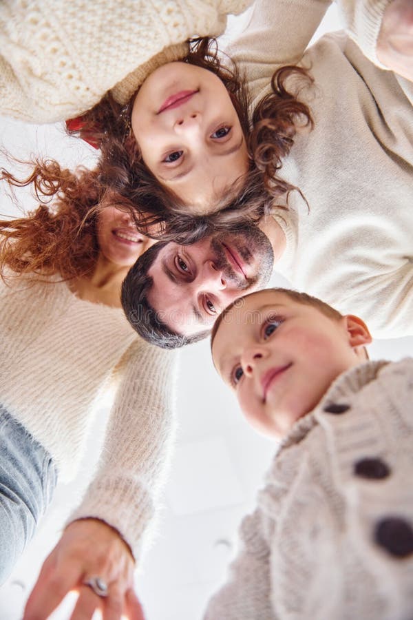 View from Below. Happy Family Looking Down and Having Fun Stock Image ...
