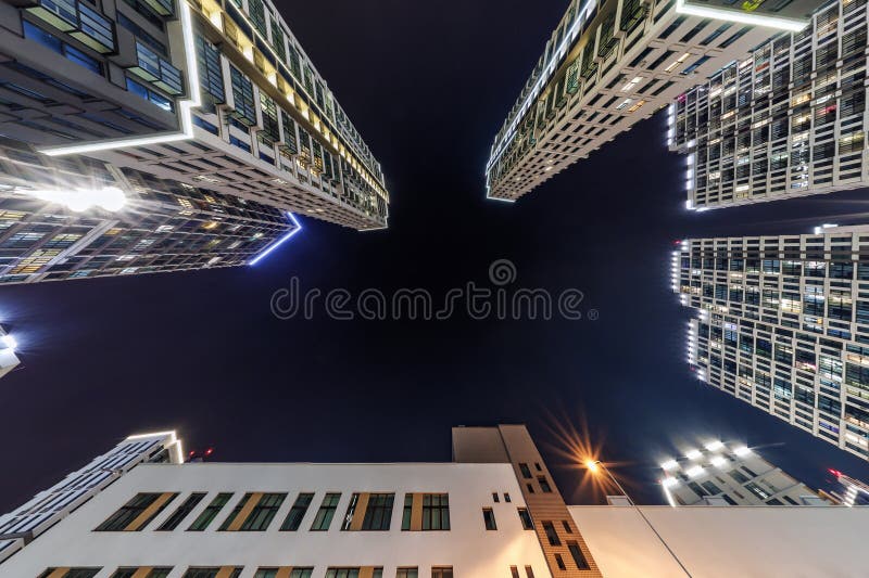 View from Below into Night Sky of Large Modern Skyscraper Residential ...