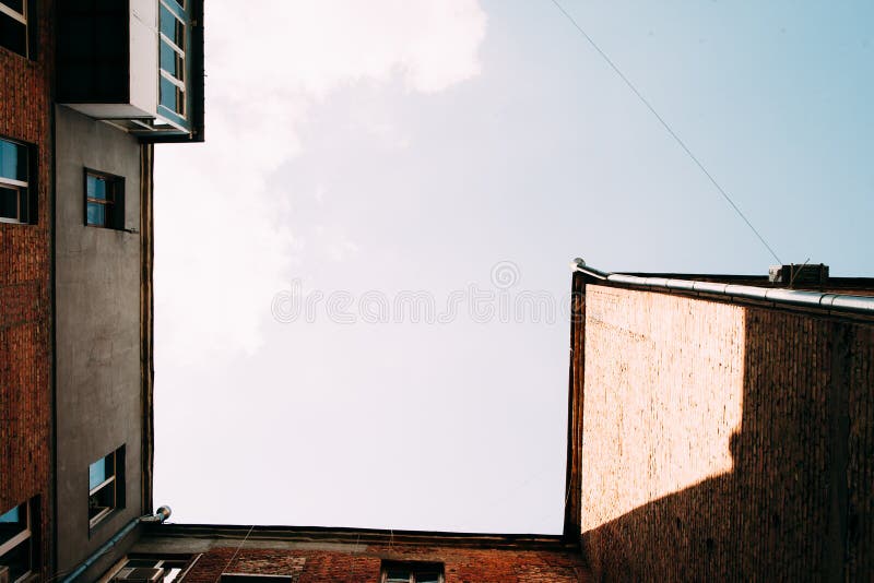 View from Below on Old Brick House with Blue Sky Stock Photo - Image of ...