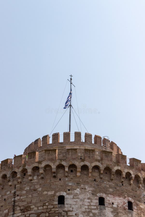 View from Below of the Top of a Stone Castle with a Wind Indicator ...