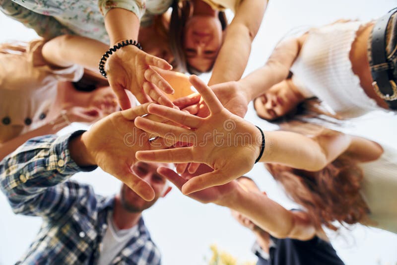View from Below of Young Positive People that Looking Down Stock Photo ...