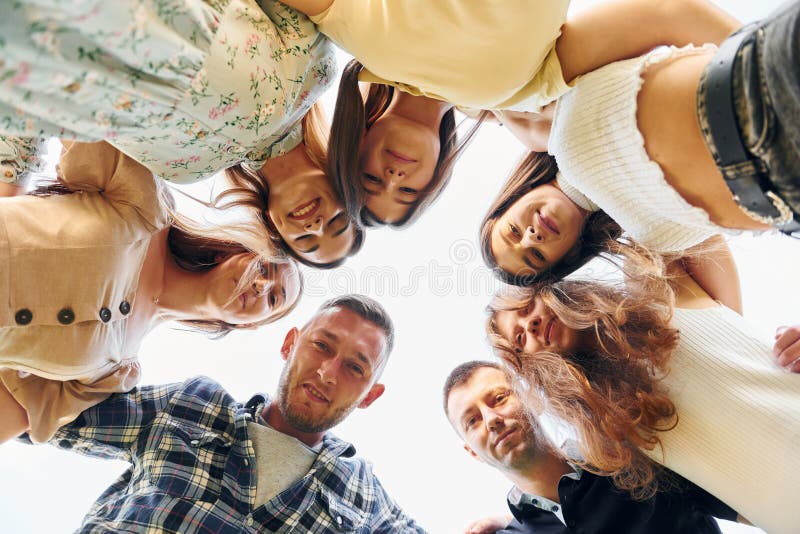 View from Below of Young Positive People that Looking Down Stock Image - Image of casual, clear ...