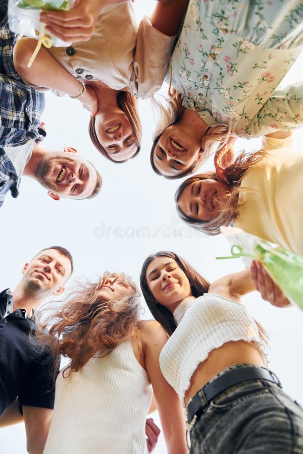 View from Below of Young Positive People that Looking Down Stock Photo ...