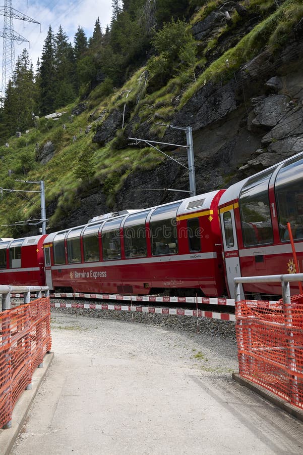 View of Bernina Express Train Passing by Editorial Stock Image - Image ...