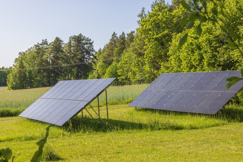 View of Big Solar Panels Installed on Ground. Stock Image - Image of ...
