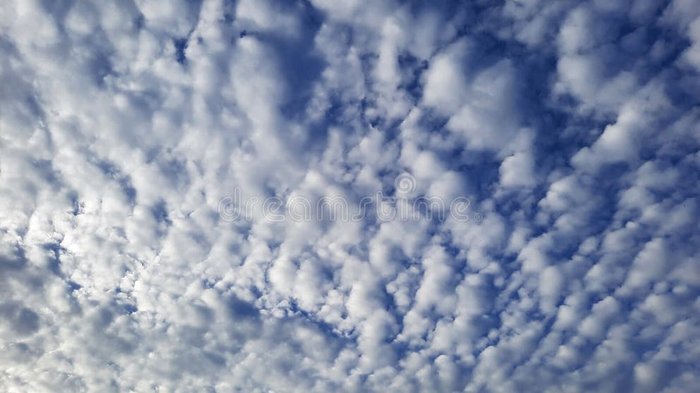 View of the Blue Sky Filled with Lumpy Clouds Stock Image - Image of ...