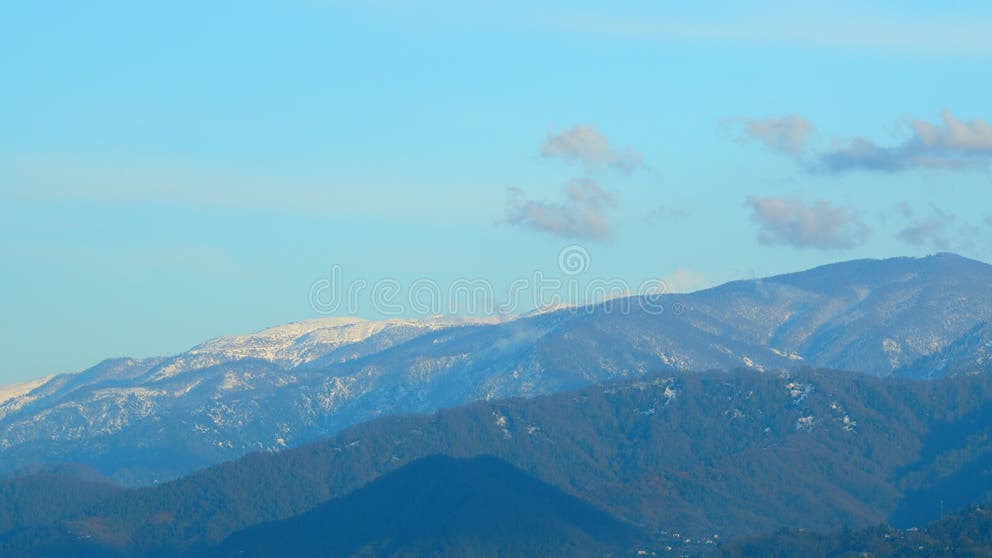 View Blue Sky Over Mountain. Sunset in a Mountain Range with Clouds ...
