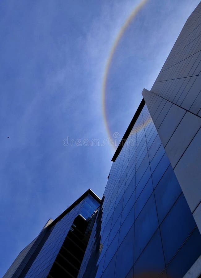 View of the Blue Sky and a Round Rainbow Stock Photo - Image of rainbow ...
