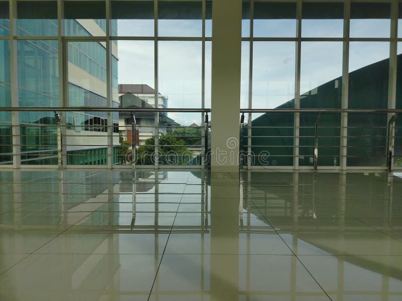 View of Blue Sky from Skyscraper with Reflection on Floor Stock Image ...
