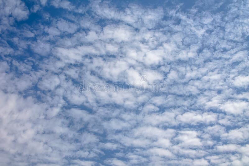 View of a Blue Sky with a Small Clouds, Different Shapes and Textured ...