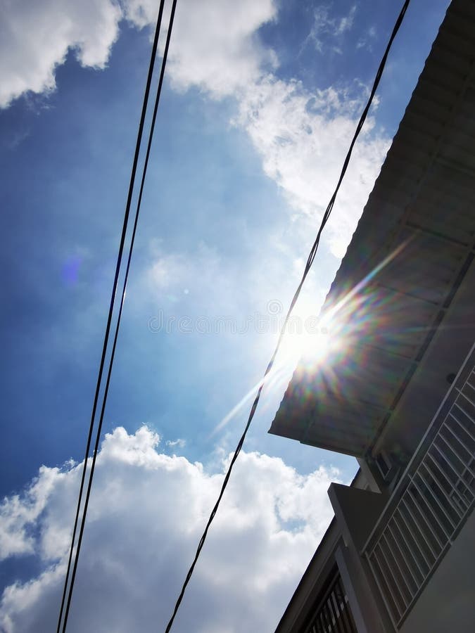 View of Blue Sky, White Clouds and Shady Trees in the Housing Complex ...