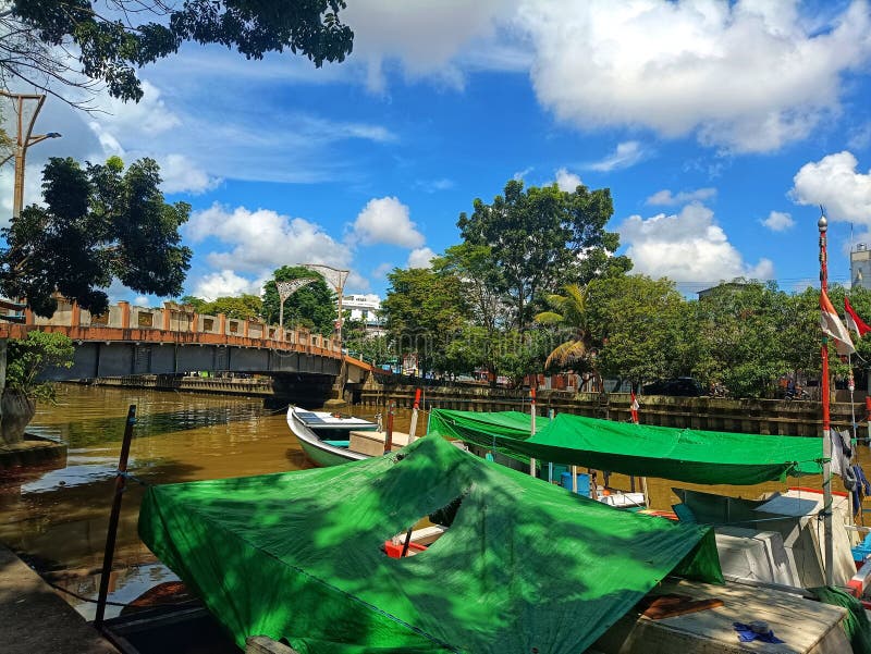 View of Boat, River, Bridge, Cloud, Sky and Trees. Outdoor Stock Photo ...