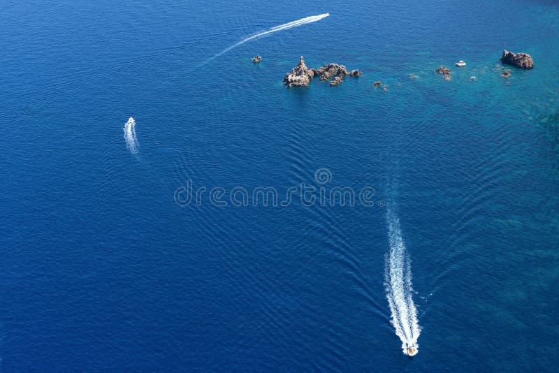 Boats Sailing on the Sea, Around the Rocks Stock Photo - Image of ship ...