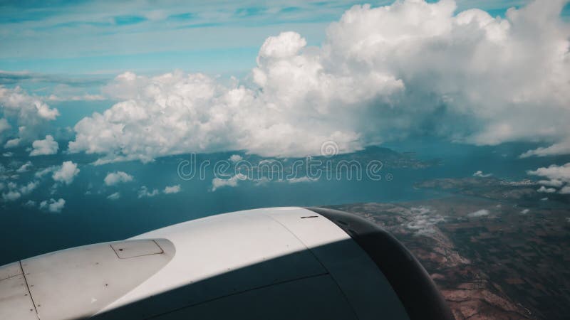 View from Boeing 737 MAX 8 on White Air Clouds, Clear Blue Sky and ...