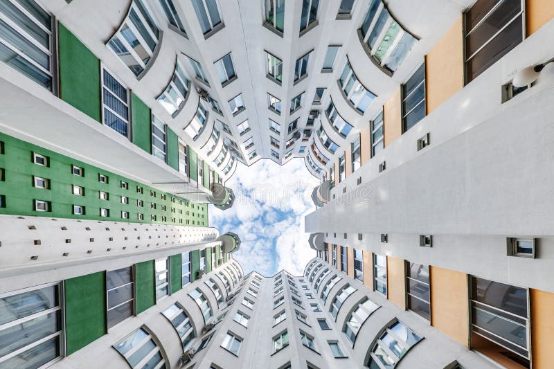 View from Bottom Up To the Sky in a Skyscraper House Well with a Narrow ...