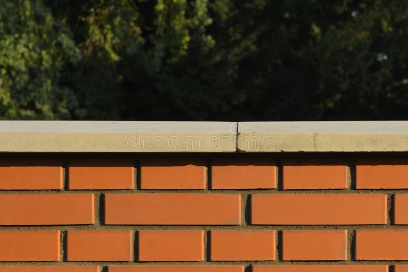 View of the Brick Base. Brick Wall with White Finished Top with ...