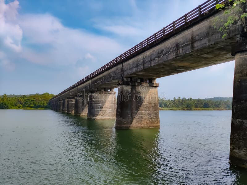 View of Bridge Across the River Under the Blue Sky Stock Image - Image ...