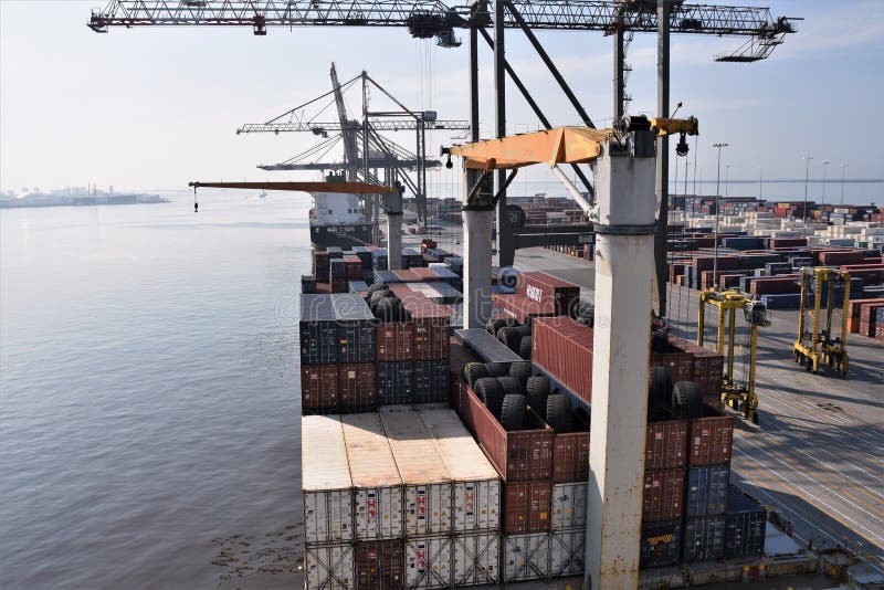 Cargo operation in port editorial stock photo. Image of boat - 53650638