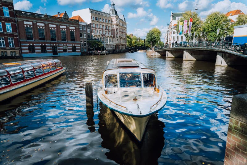 View on the Bridge through the River Channel with Boat in Front ...