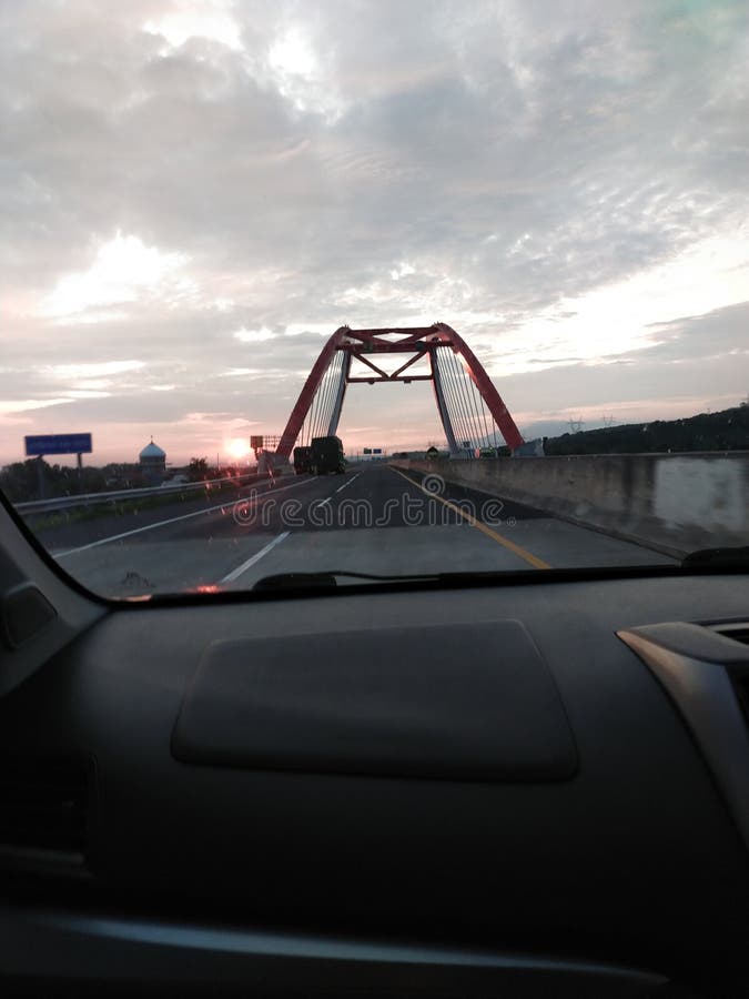 View of the Bridge at Sunrise, Taken from Inside a Moving Car Stock ...