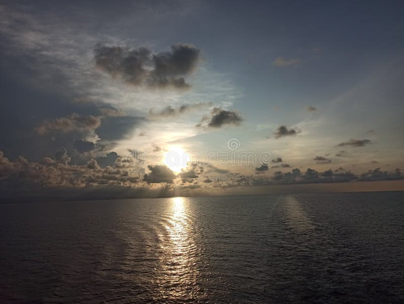 View of the Sun at Noon in the Middle of the Sea Stock Photo - Image of ...