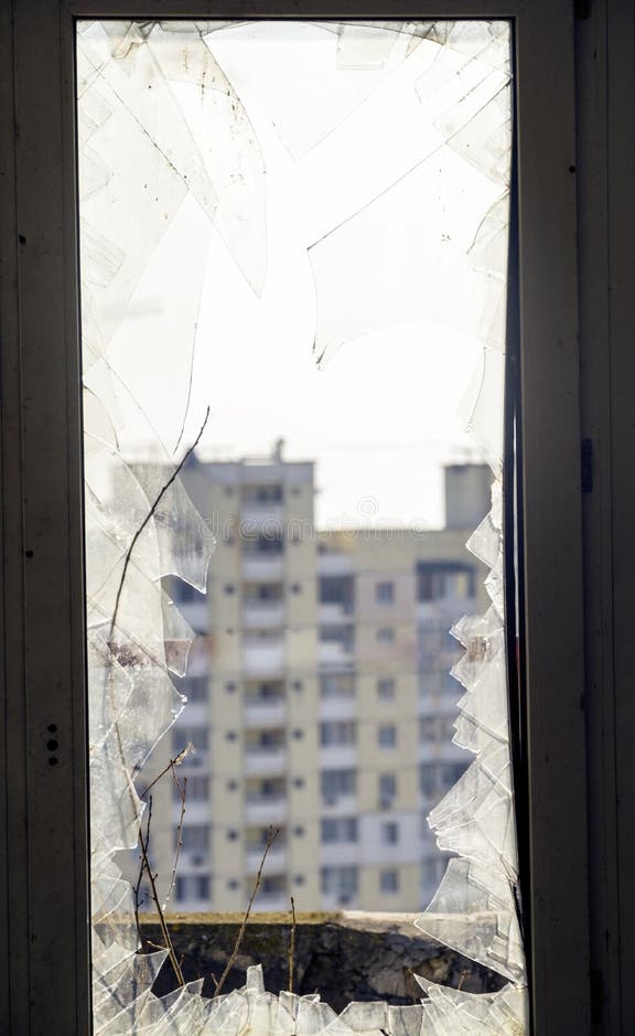 View of a Broken Plastic Window on the Background of the Building Stock ...