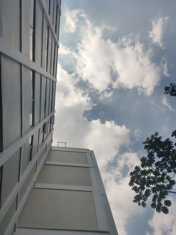 View of Buildings and Trees with a View from Below. Stock Image - Image ...