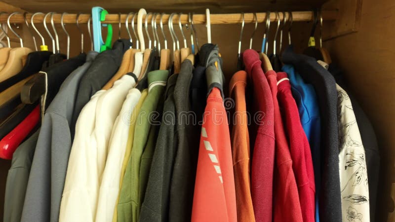 A View into a Built-in Wardrobe Filled with Men S Clothes. Men S ...