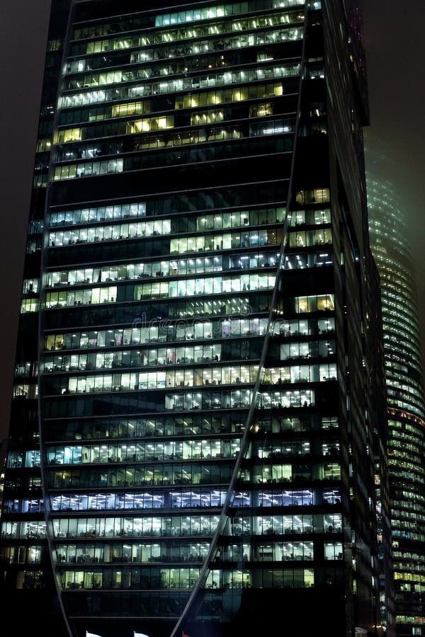 View of the Burning Windows of the Modern Office Building at Night. the ...