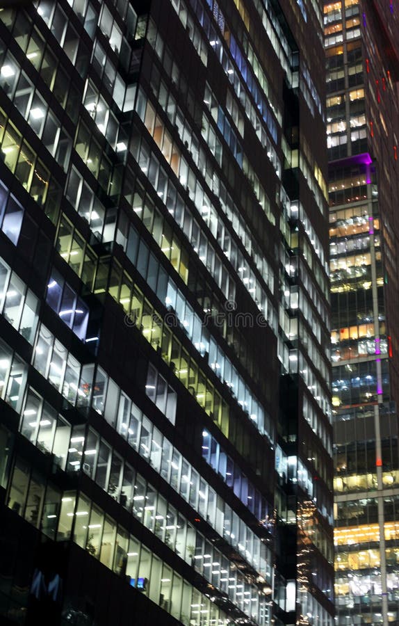 View of the Burning Windows of the Modern Office Building at Night. the ...