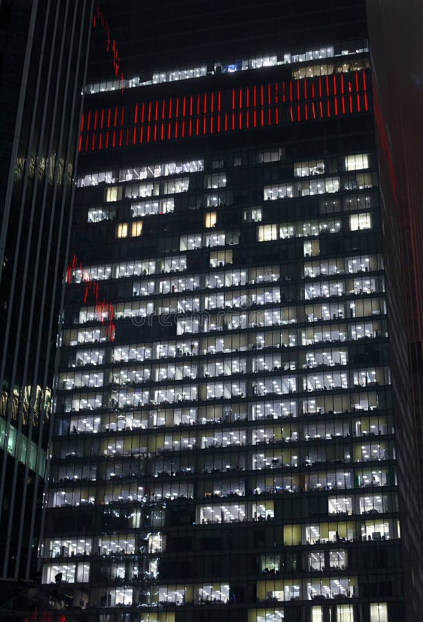 View of the Burning Windows of the Modern Office Building at Night. the ...