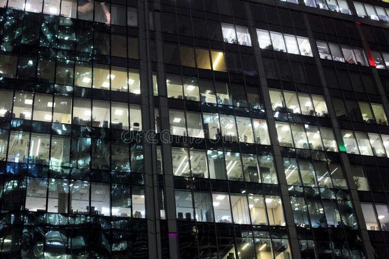 View of the Burning Windows of the Modern Office Building at Night. the ...