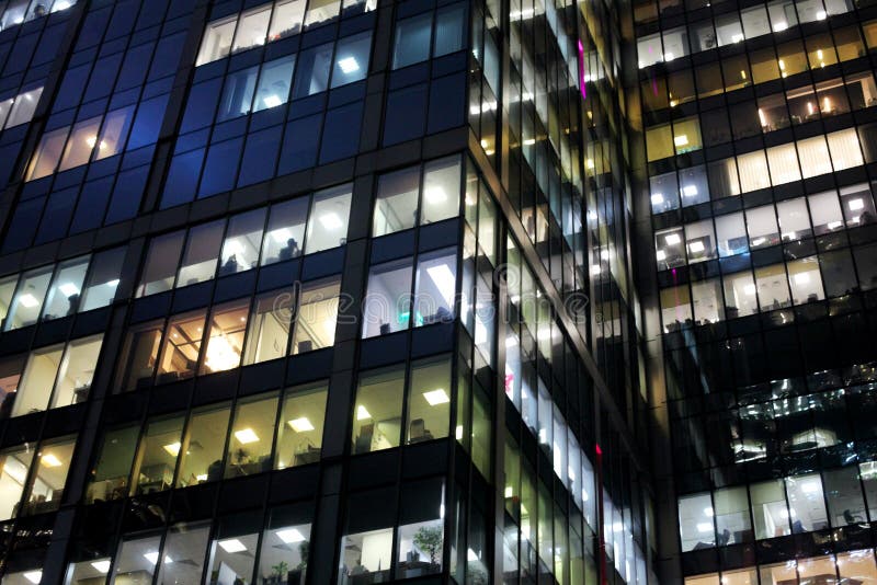View of the Burning Windows of the Modern Office Building at Night. the ...