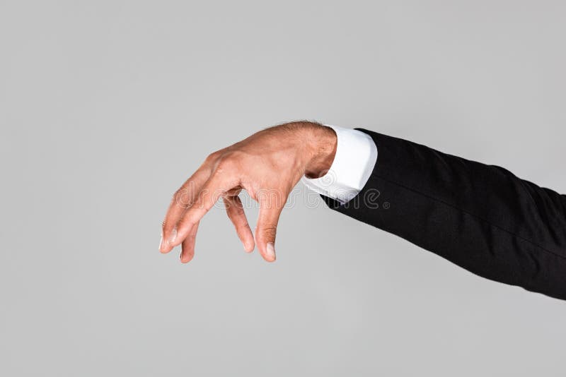 View of Businessman Grabbing Hand Isolated on Grey Stock Image - Image ...