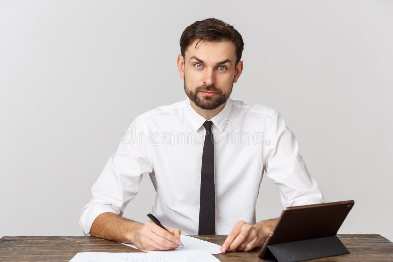 A View of a Busy Businessman Signing a Document in the Office Against ...
