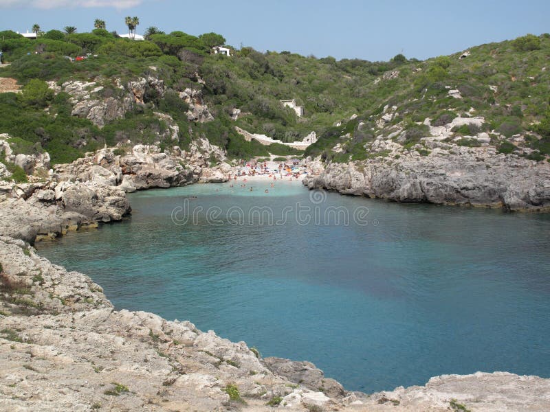 Cala de Binidali bay stock image. Image of swimming - 118185471