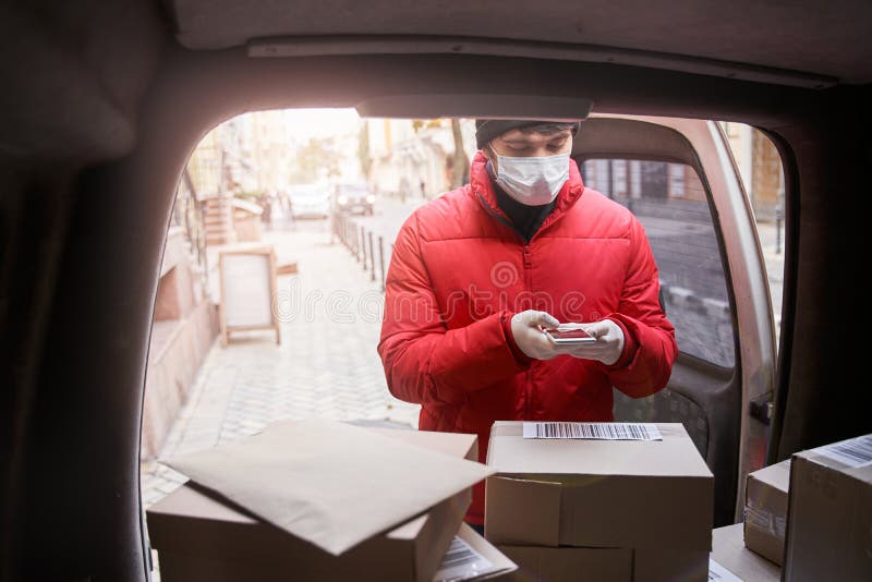 Courier in Protective Mask Scanning a Barcode Stock Image - Image of ...