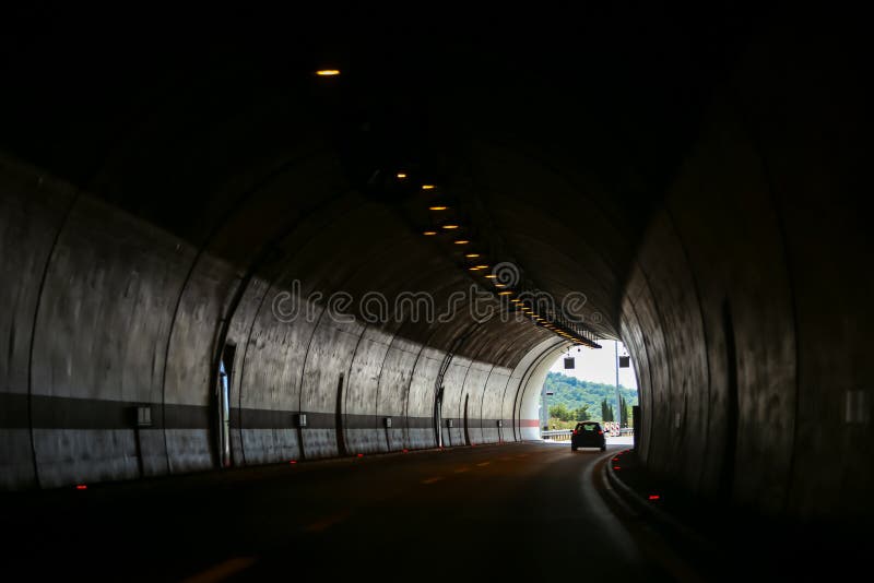 Car driving in tunnel stock photo. Image of outdoors - 99363654