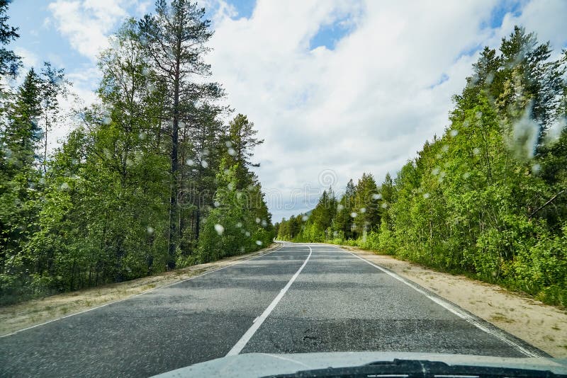View from Car Window on the Road and Landscape with Forest, Tees, and ...