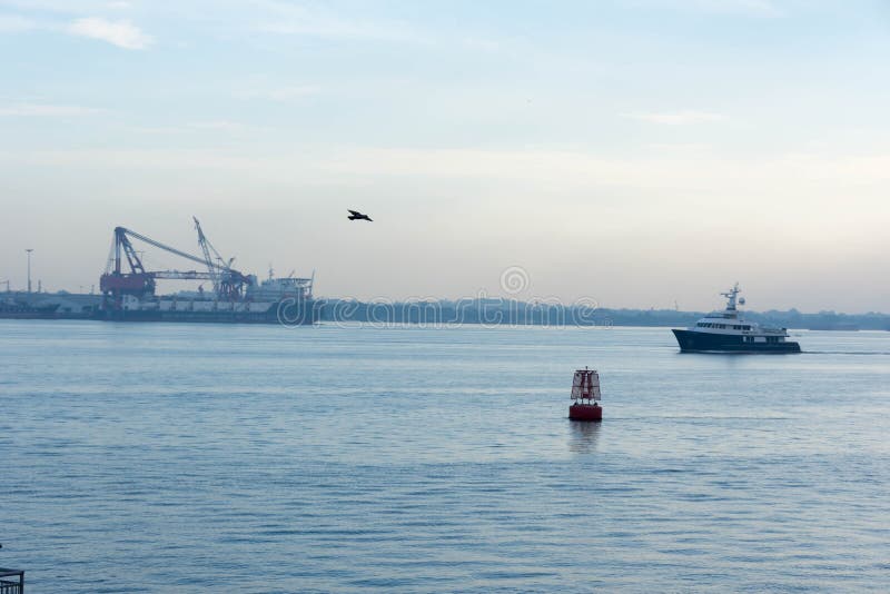 A View of a Cargo Ship Navigating in the Waters of Singapore Editorial ...