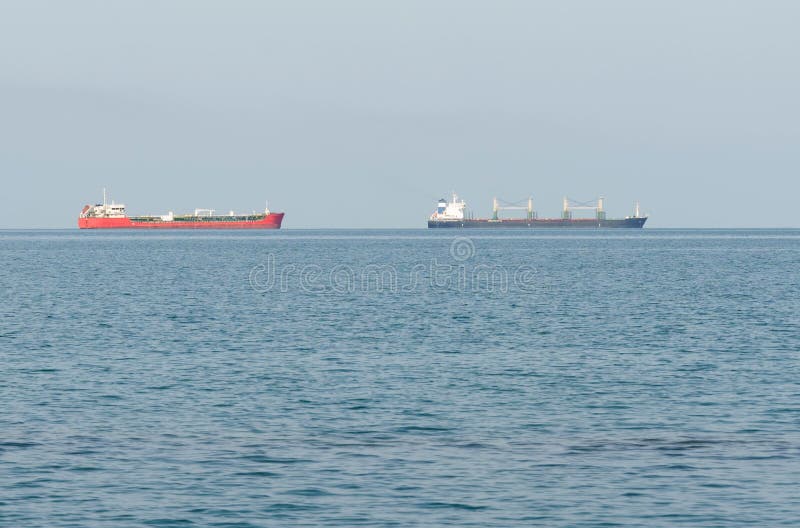 A View of Cargo Ships Moving Far Across the Sea. Stock Photo - Image of ...