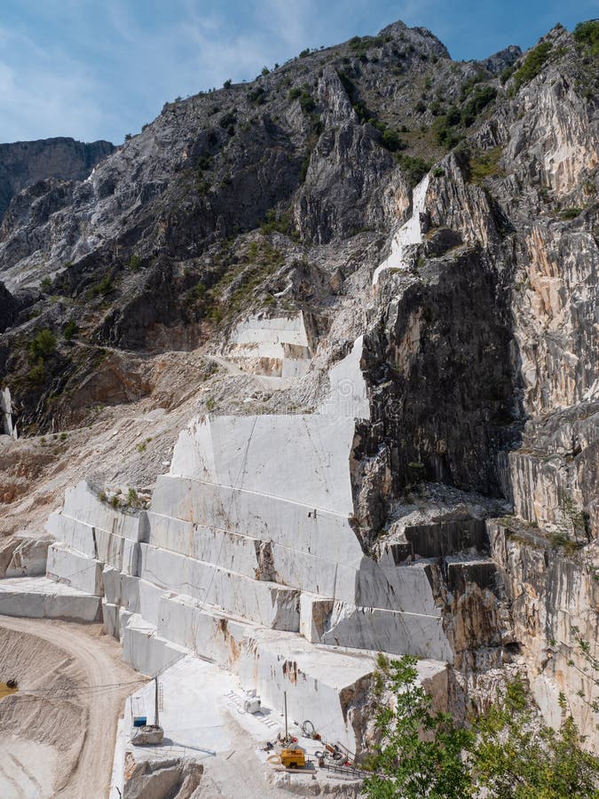 View of the Carrara Marble Quarries with Excavation Vehicles Ready for ...